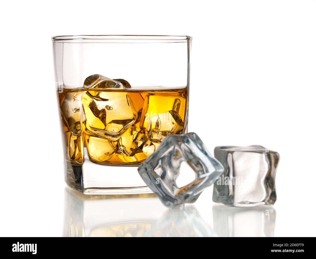Glass of whiskey on the rocks and ice cubes, isolated on whte Stock ...