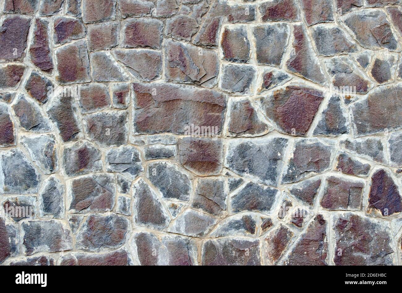 Stone wall texture background natural color Stock Photo - Alamy