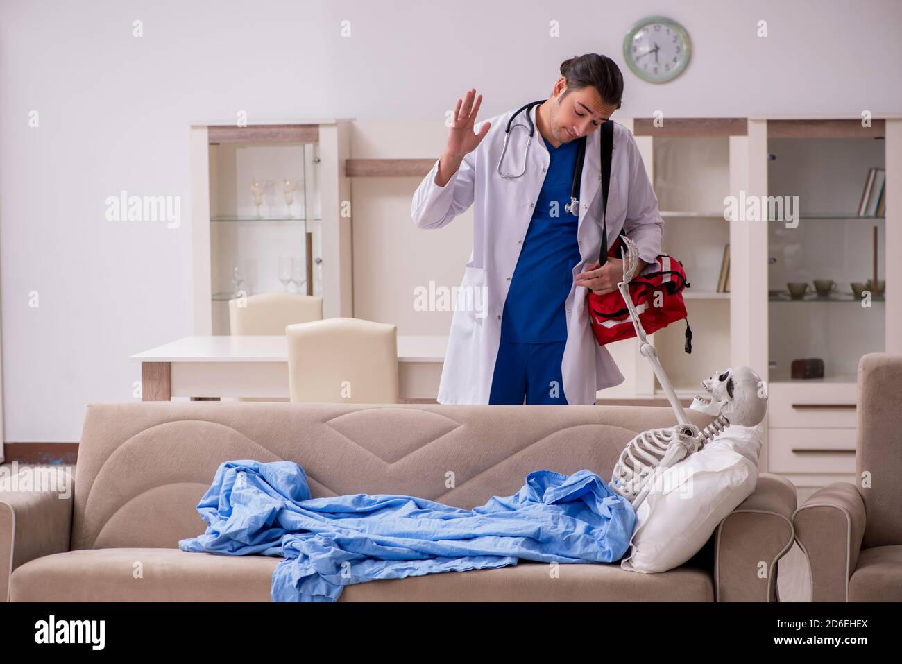 Male paramedic visiting skeleton patient Stock Photo - Alamy