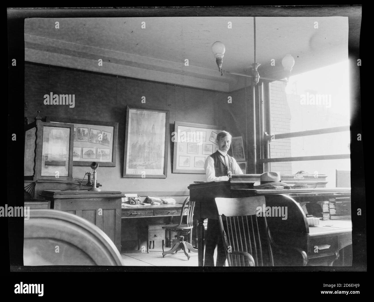 Photographer Charles R. Clark, probably in his studio, Chicago ...