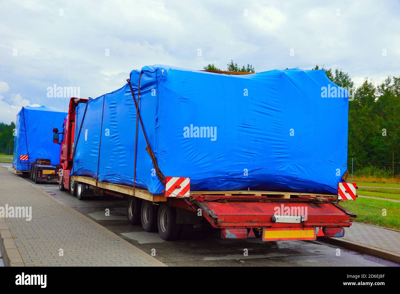 A truck with a special semi-trailer for transporting oversized loads ...