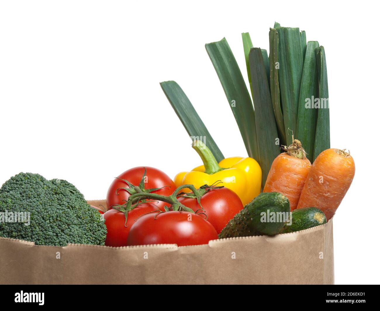 Bag full of vegetables, isolated on white Stock Photo - Alamy