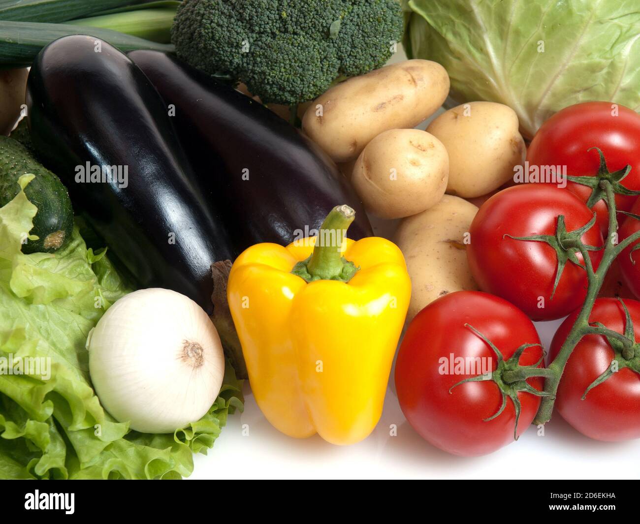 Large group of fresh vegetables on white background Stock Photo - Alamy