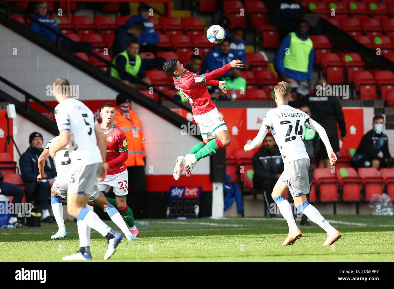 Josh Gordon (10) of Walsall controls the ball on his chest Stock Photo ...