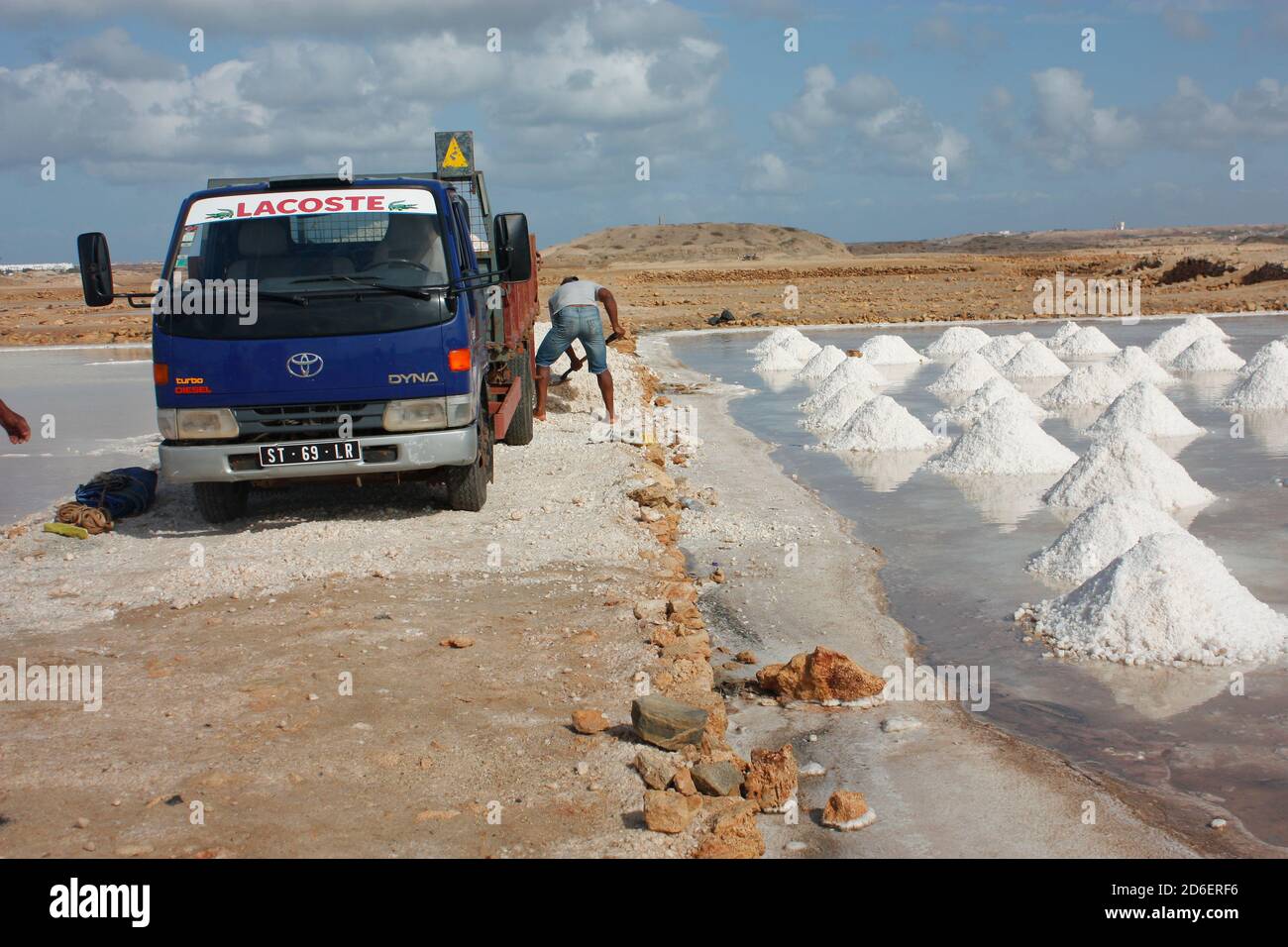 Loading salt in to a truck, harvesting salt Stock Photo - Alamy