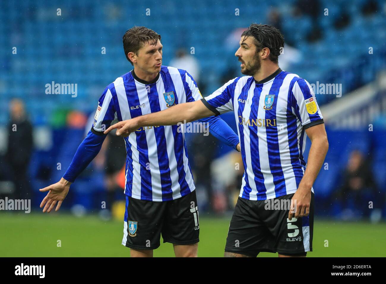 Callum Paterson (5) of Sheffield Wednesday and Adam Reach (11) of ...