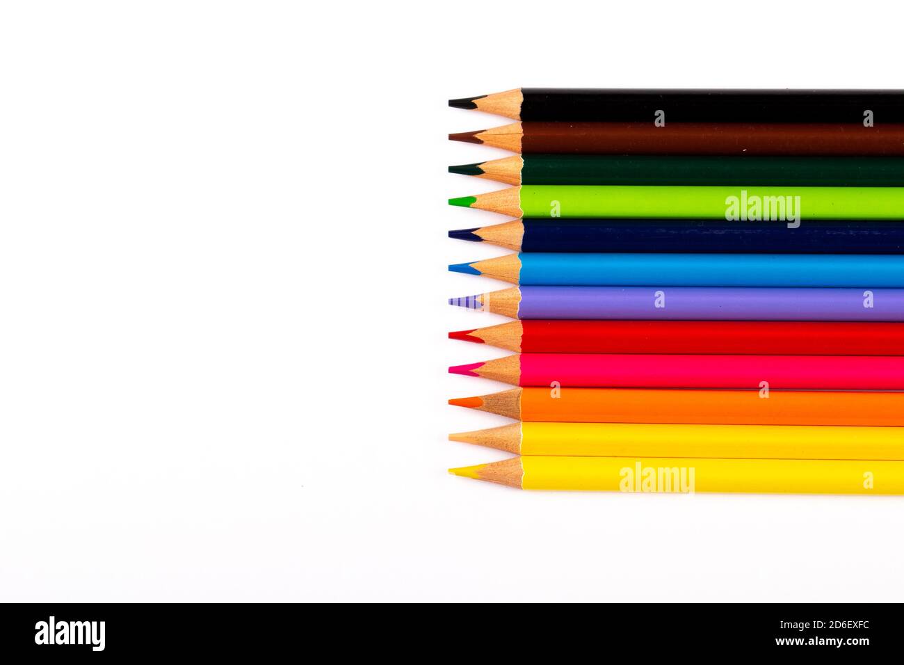 Stacked colored pencils on a light background. Side view Stock Photo ...