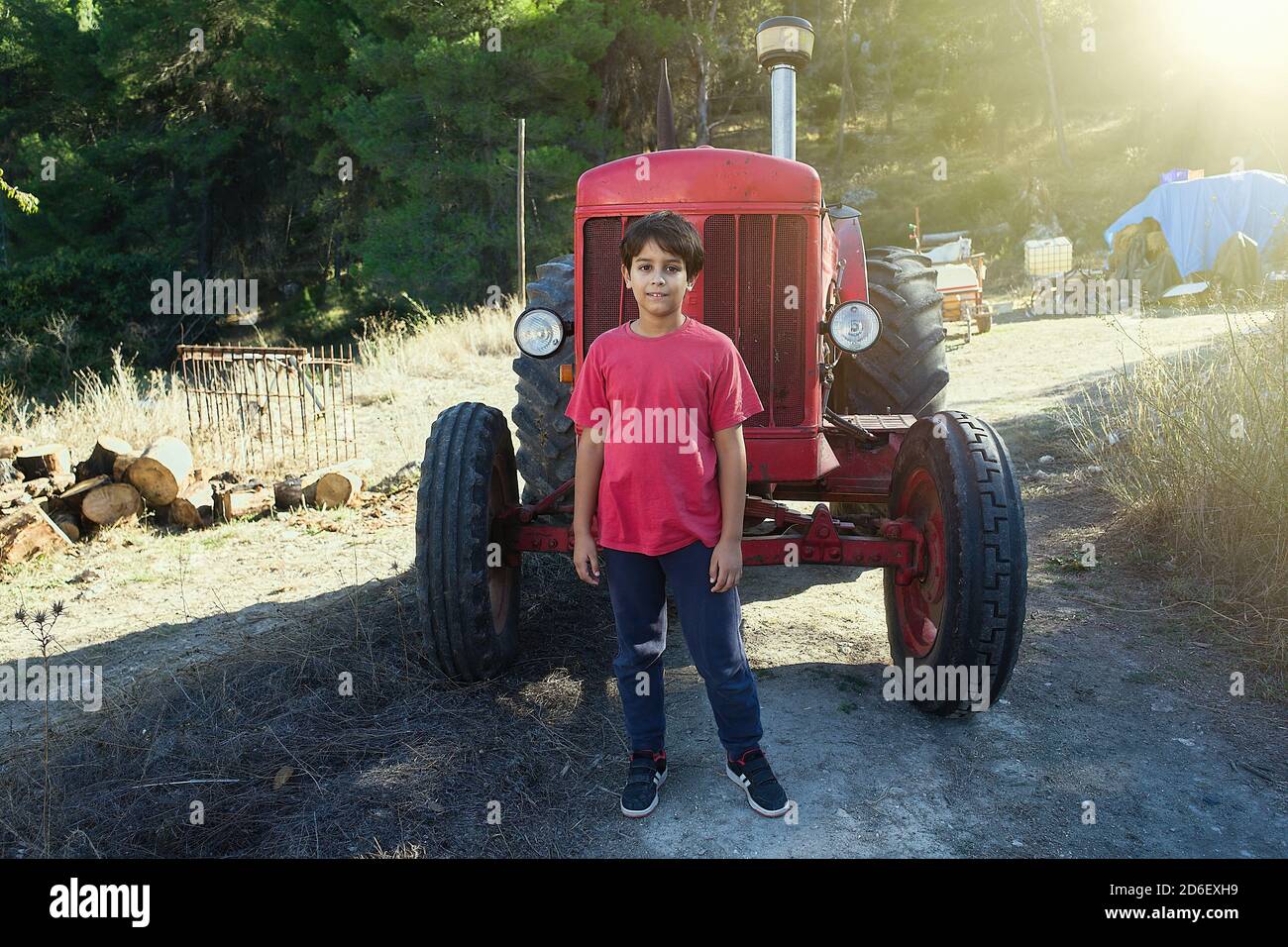 Boy farming in field with tractor hi-res stock photography and images ...