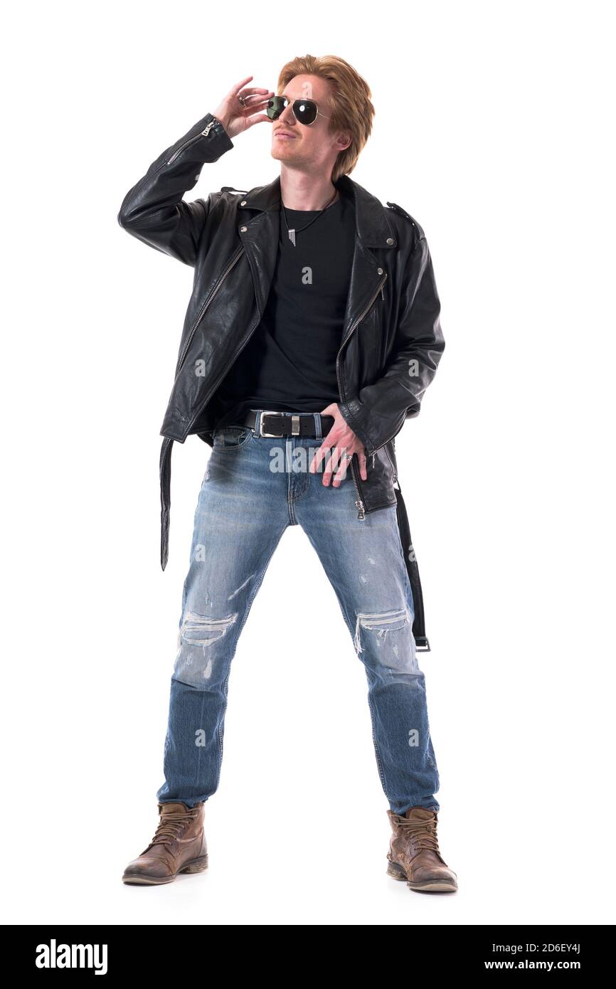 Confident happy satisfied stylish handsome biker man looking up and ...