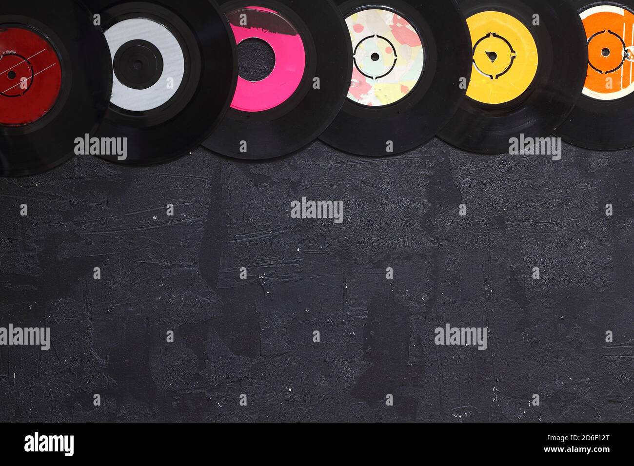 Vinyl record on a black background. Retro style. Top view Stock Photo ...