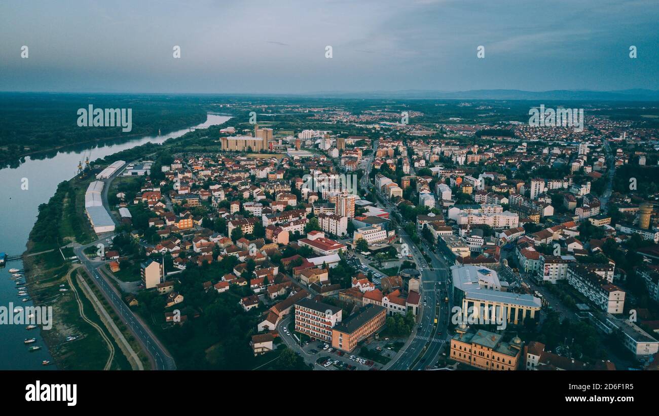 Aerial shot of a river going through a city Stock Photo - Alamy