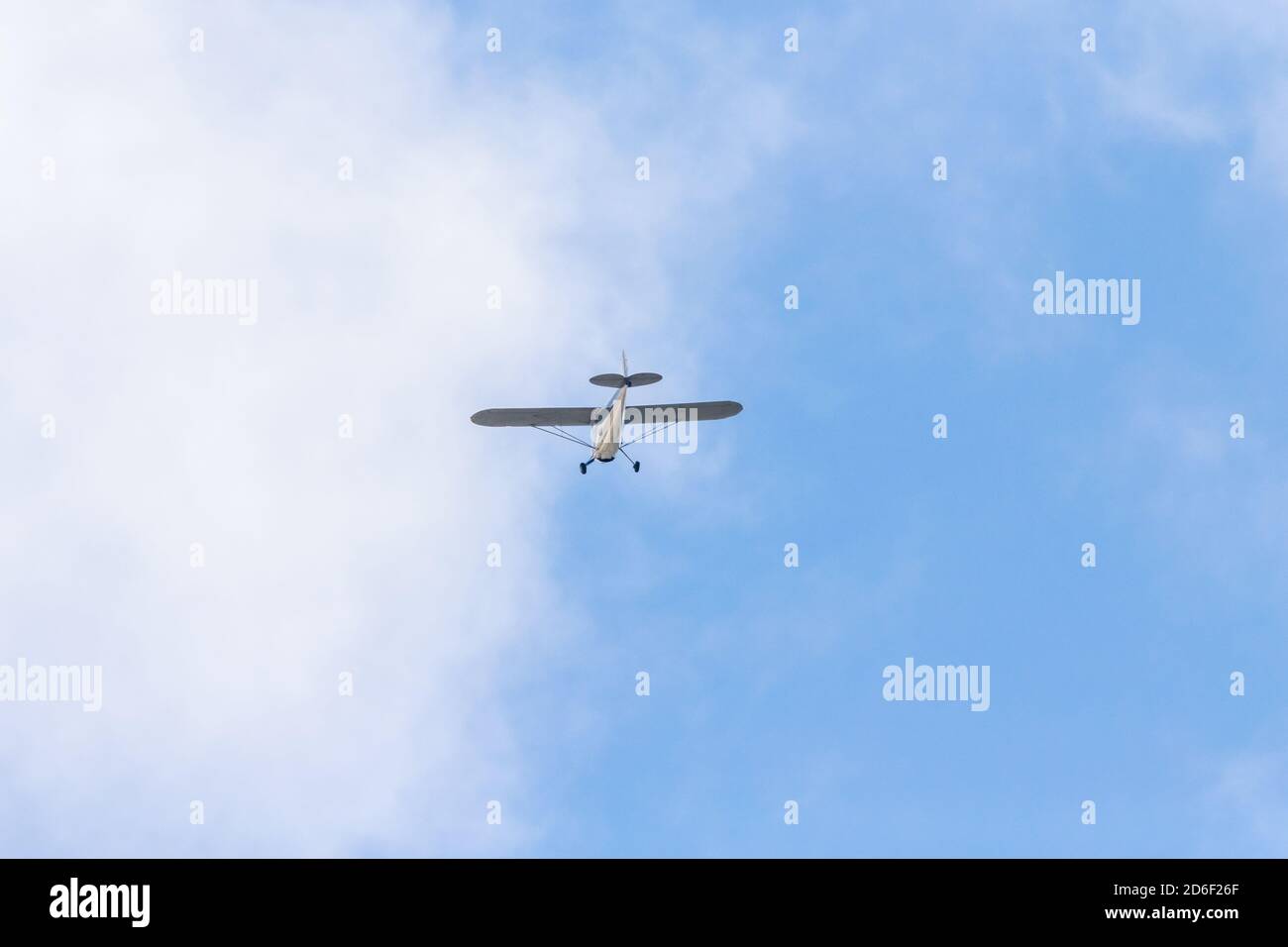 A small plane, a propeller plane approaching from below Stock Photo - Alamy
