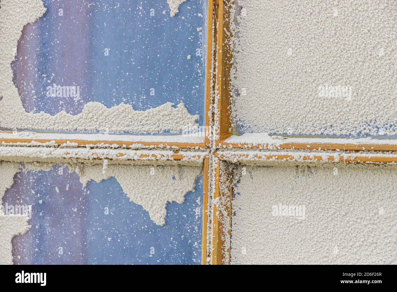 Sand drift on the window of a house on the beach - close up - sand ...