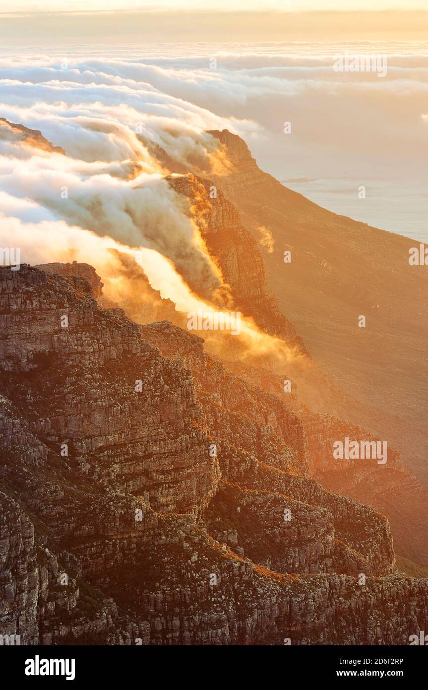 Table mountain sunset, cloud blanket over the mountain Stock Photo - Alamy