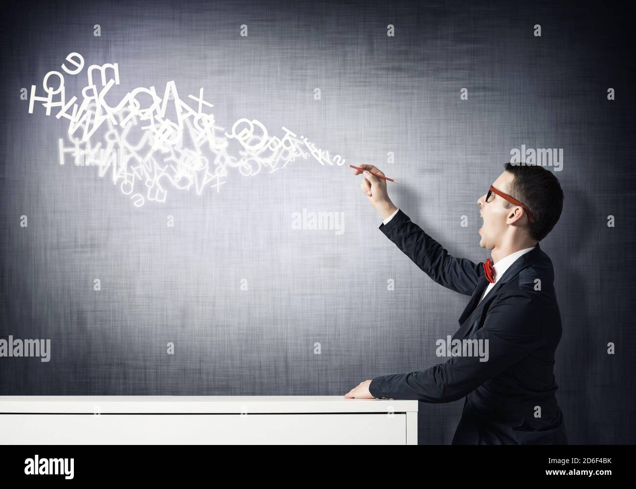 Smart guy draw on wall Stock Photo - Alamy