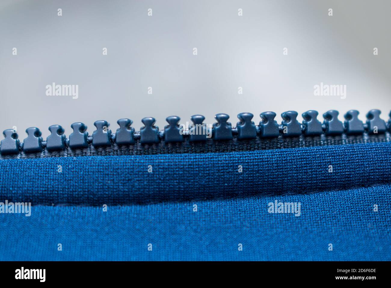 Blue zipper jacket hi-res stock photography and images - Alamy