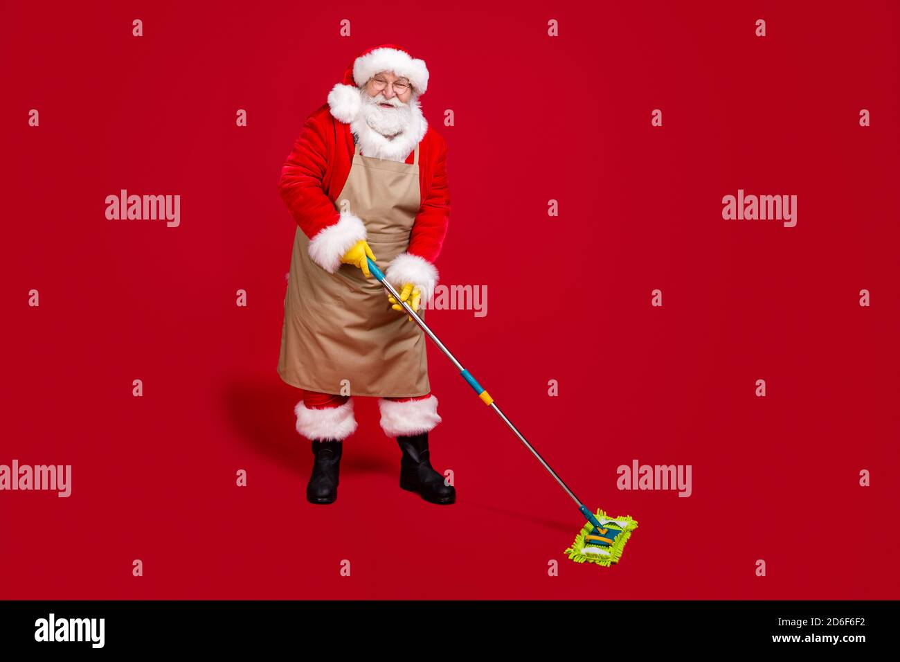 Full length photo of white grey hair bearded santa claus wash floor mop ...