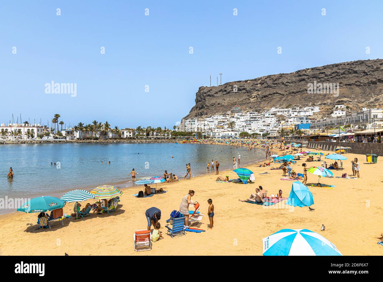 Playa Mogan - On the beach of the popular port town of Puerto de Mogan ...