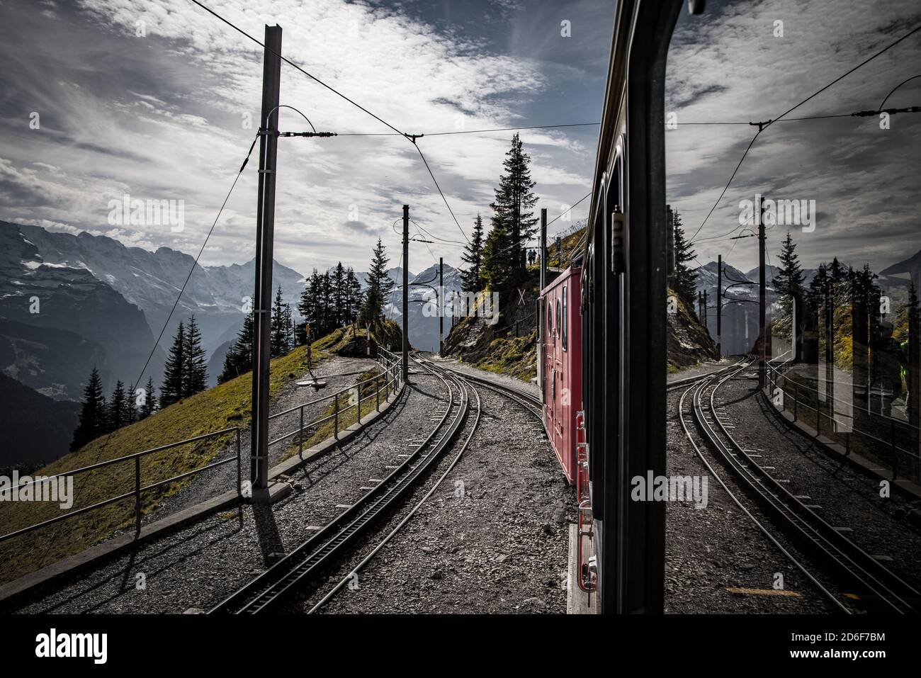 Cog railway train in the Swiss Alps Stock Photo - Alamy