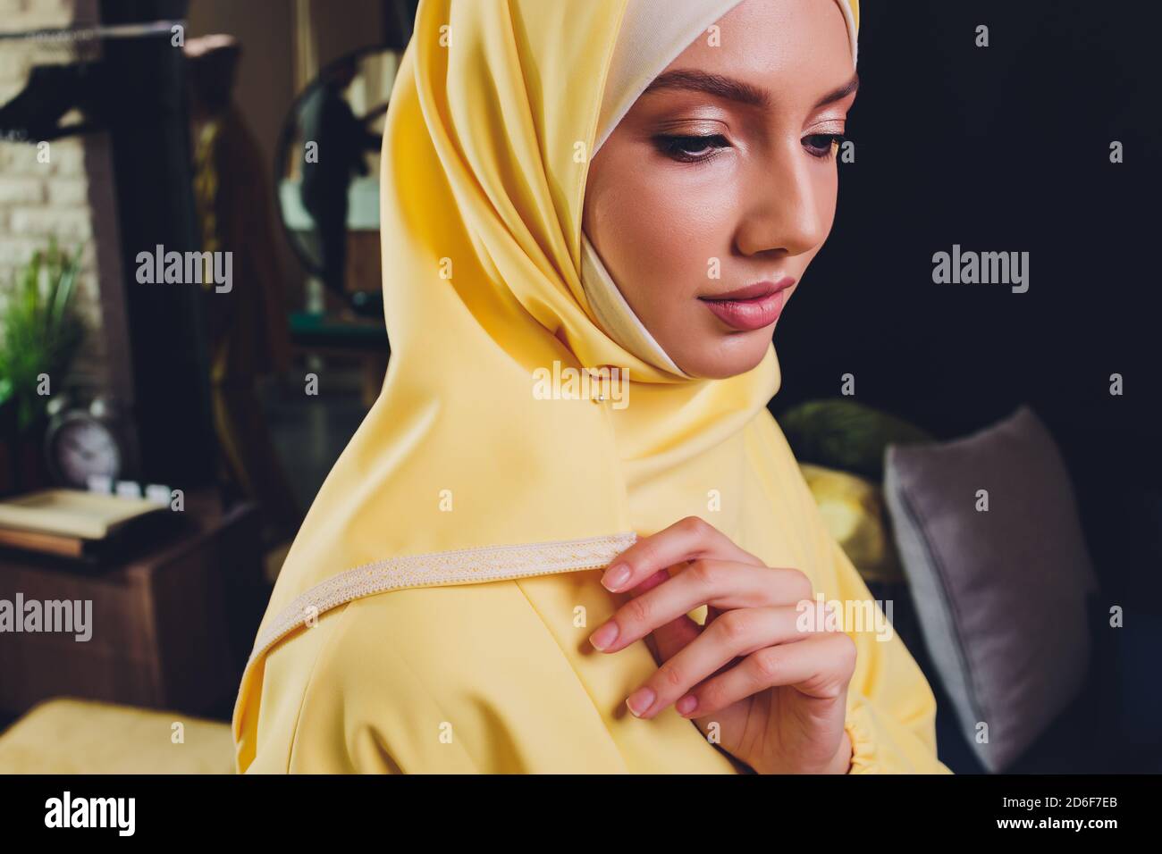 Portrait of positive pretty young Arabian woman in pink headscarf ...