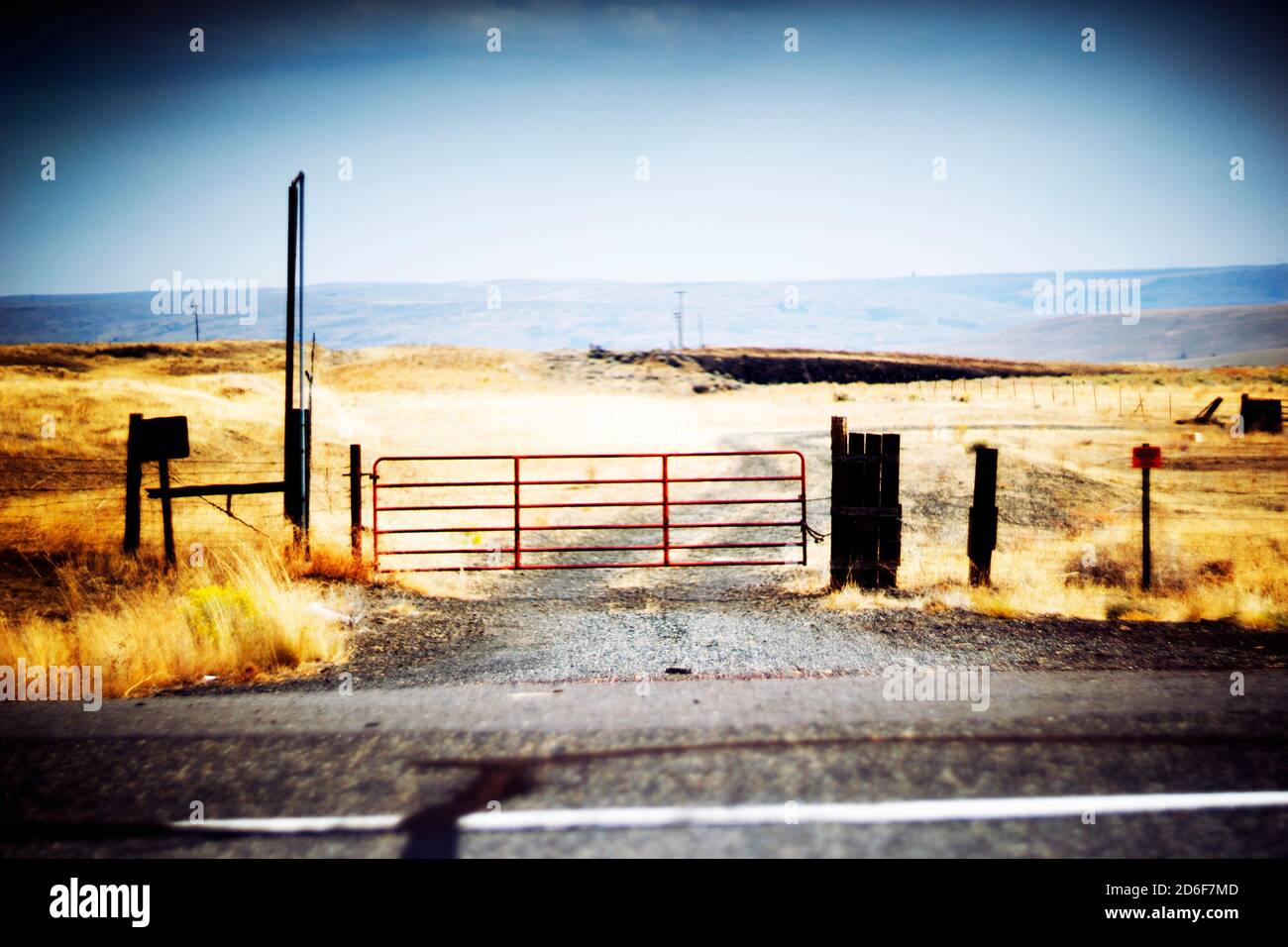 Metal Gate along Rural Highway Stock Photo - Alamy