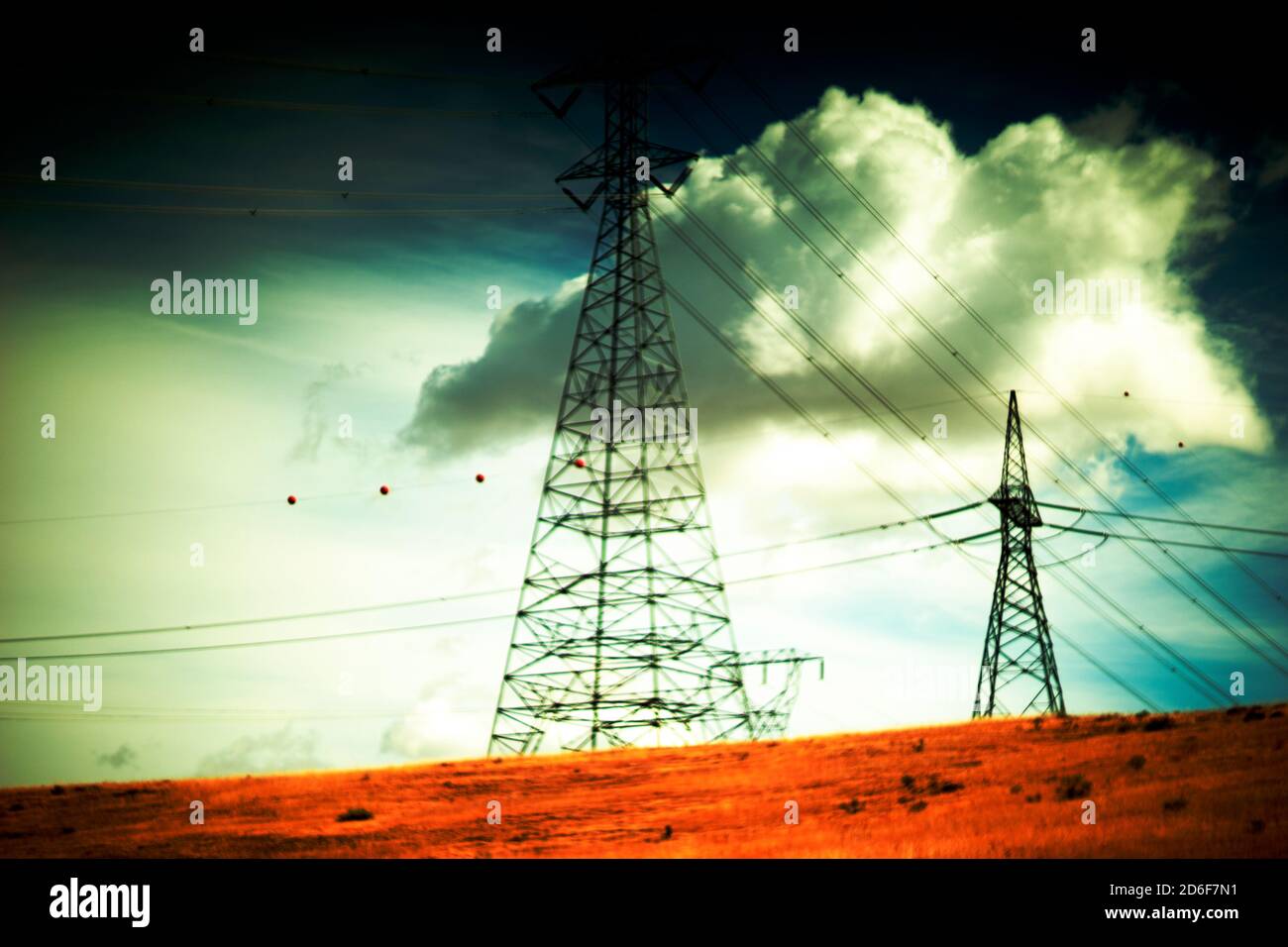 Transmission Towers and Cloudy Sky in Rural Landscape Stock Photo - Alamy