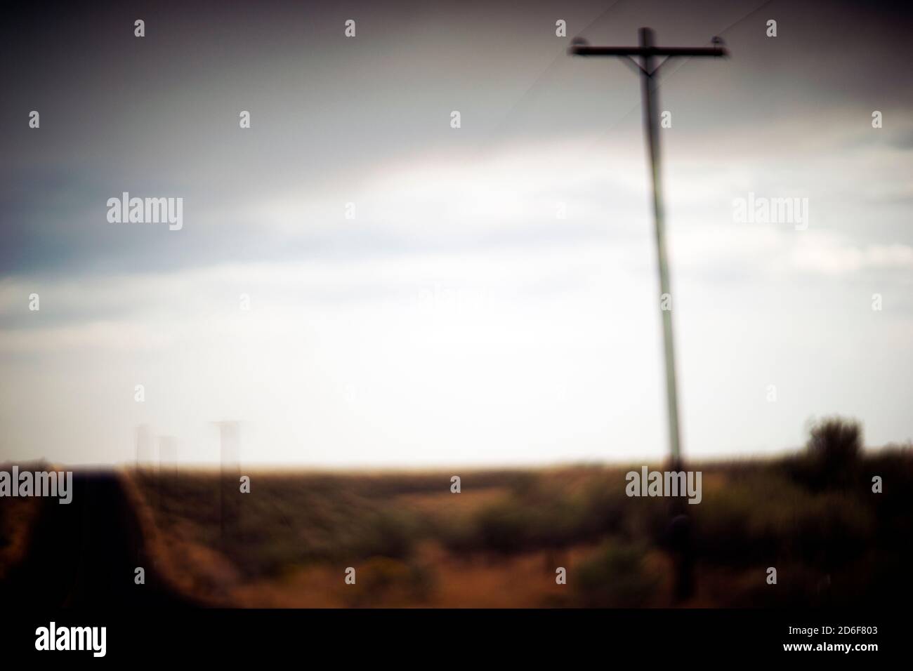 Utility Poles along Roadside, Soft Focus Stock Photo - Alamy