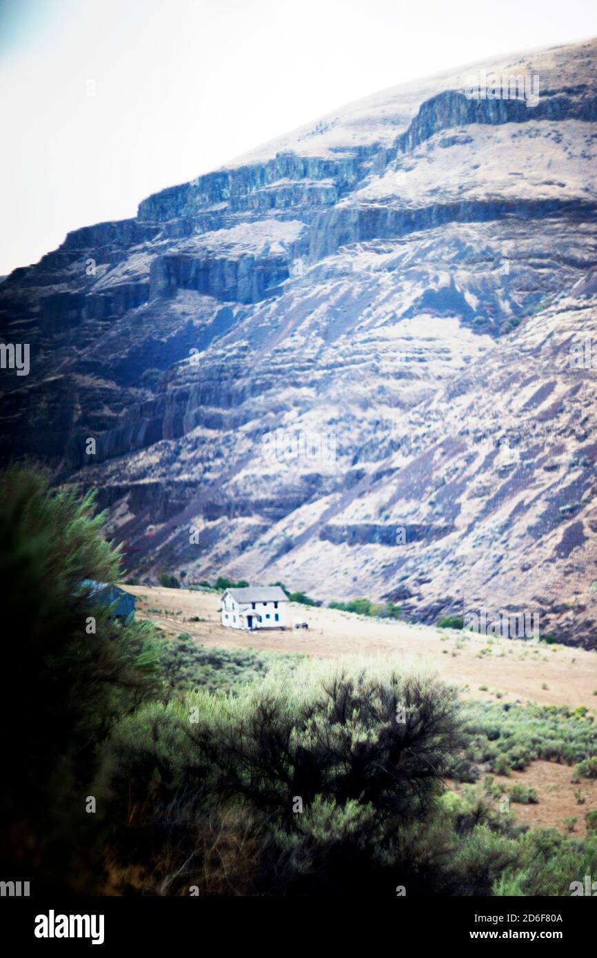 Farmhouse in Remote Valley Stock Photo - Alamy