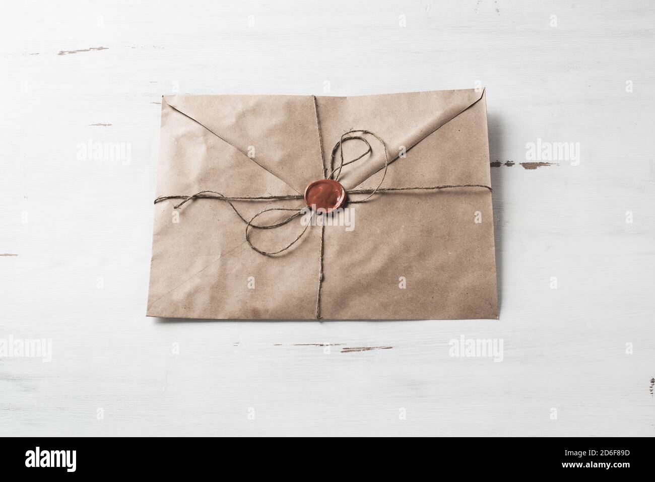 Letter with seal on table Stock Photo - Alamy