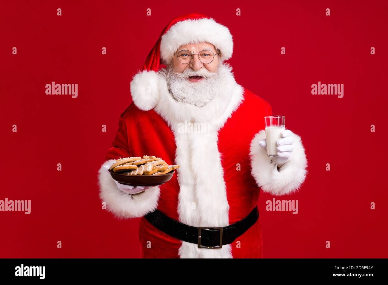 Photo of crazy funky santa claus hold x-mas tradition ginger bread ...