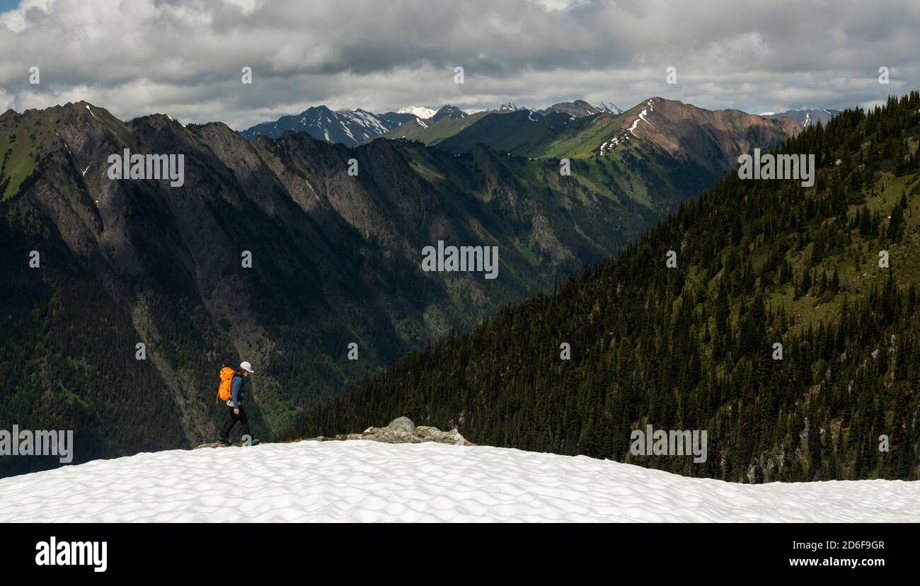 Traveler hiker walking on snow hi-res stock photography and images - Alamy