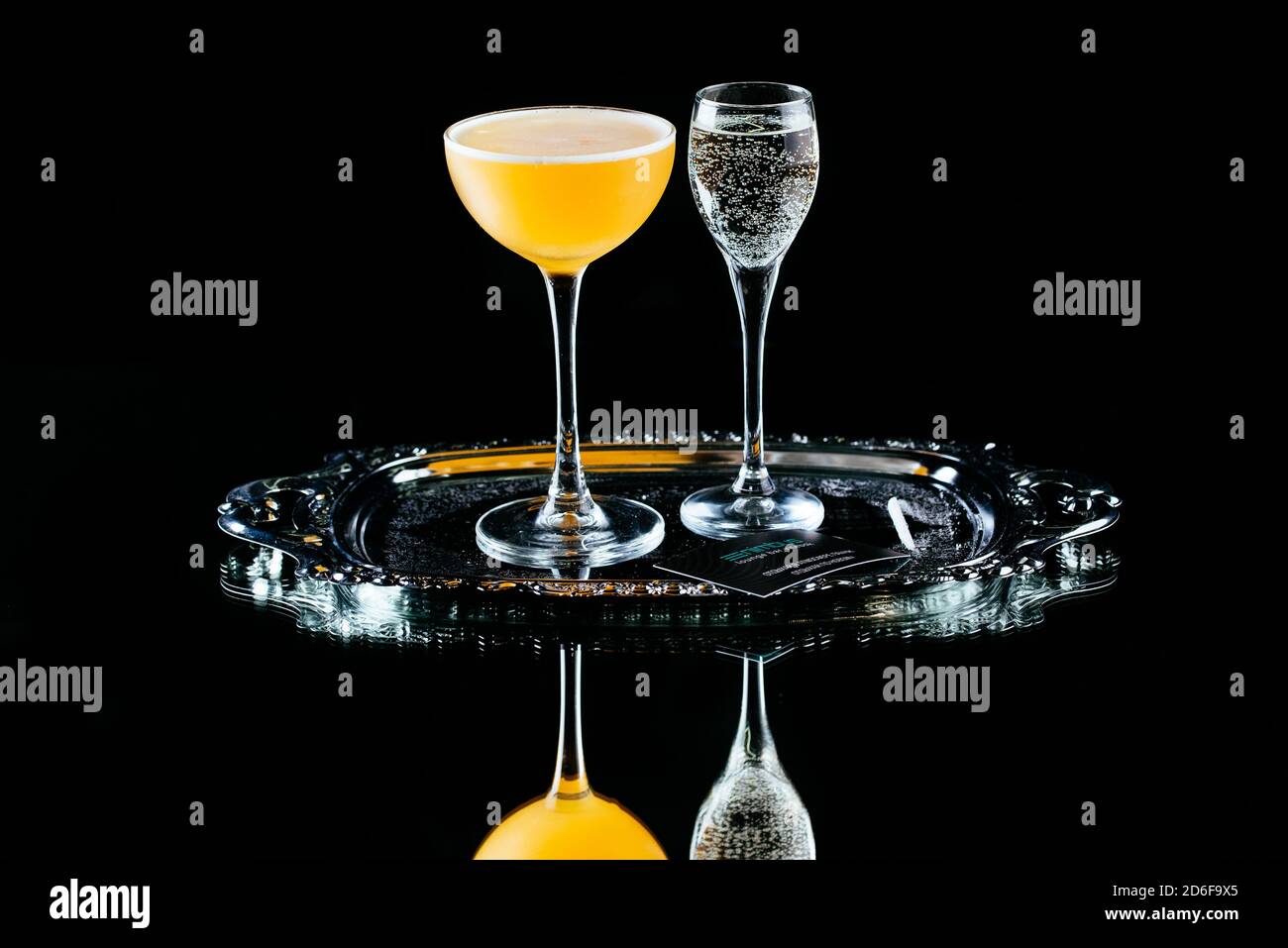 alcoholic cocktails on a mirror background Stock Photo - Alamy