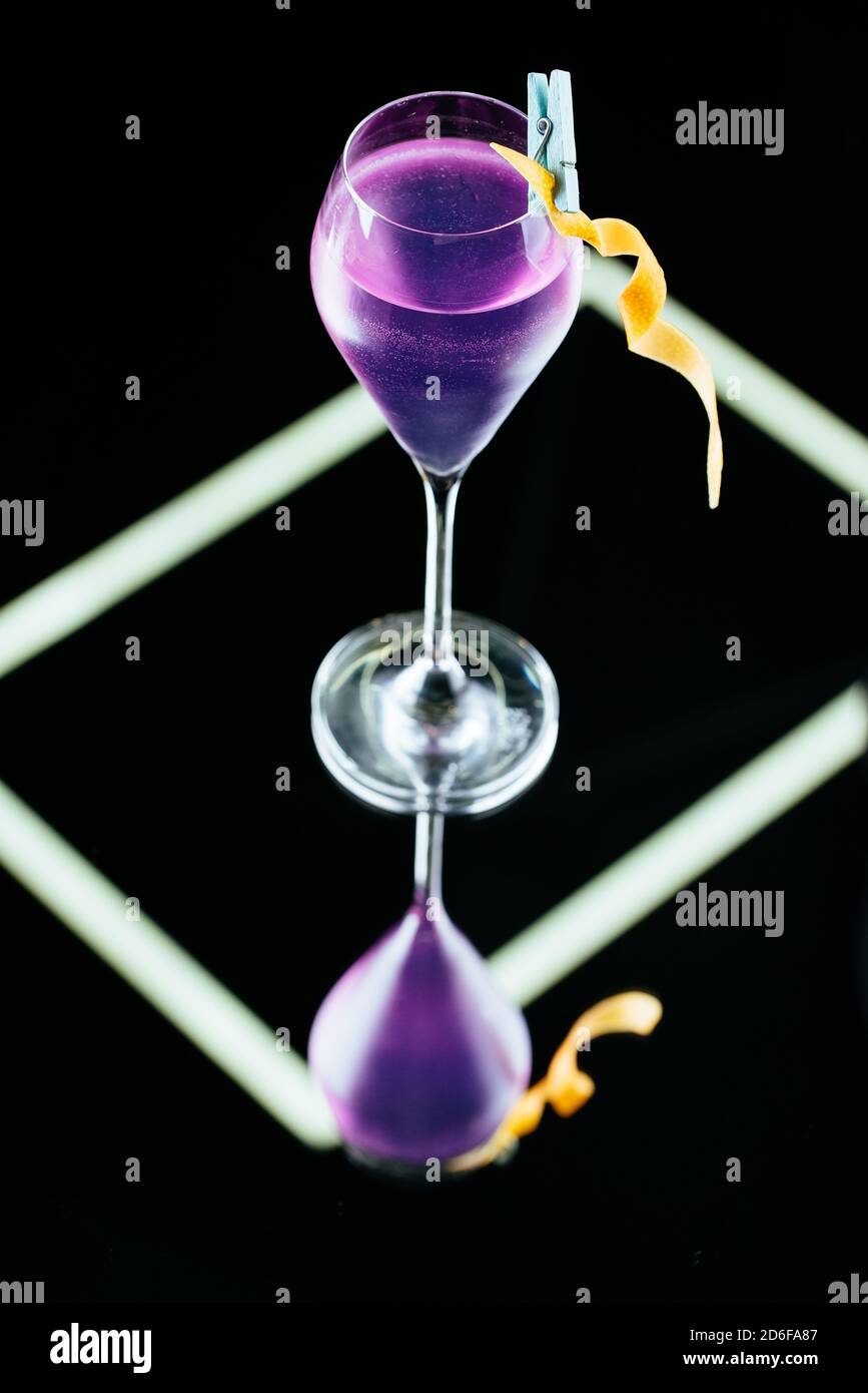 alcoholic cocktails on a mirror background Stock Photo - Alamy