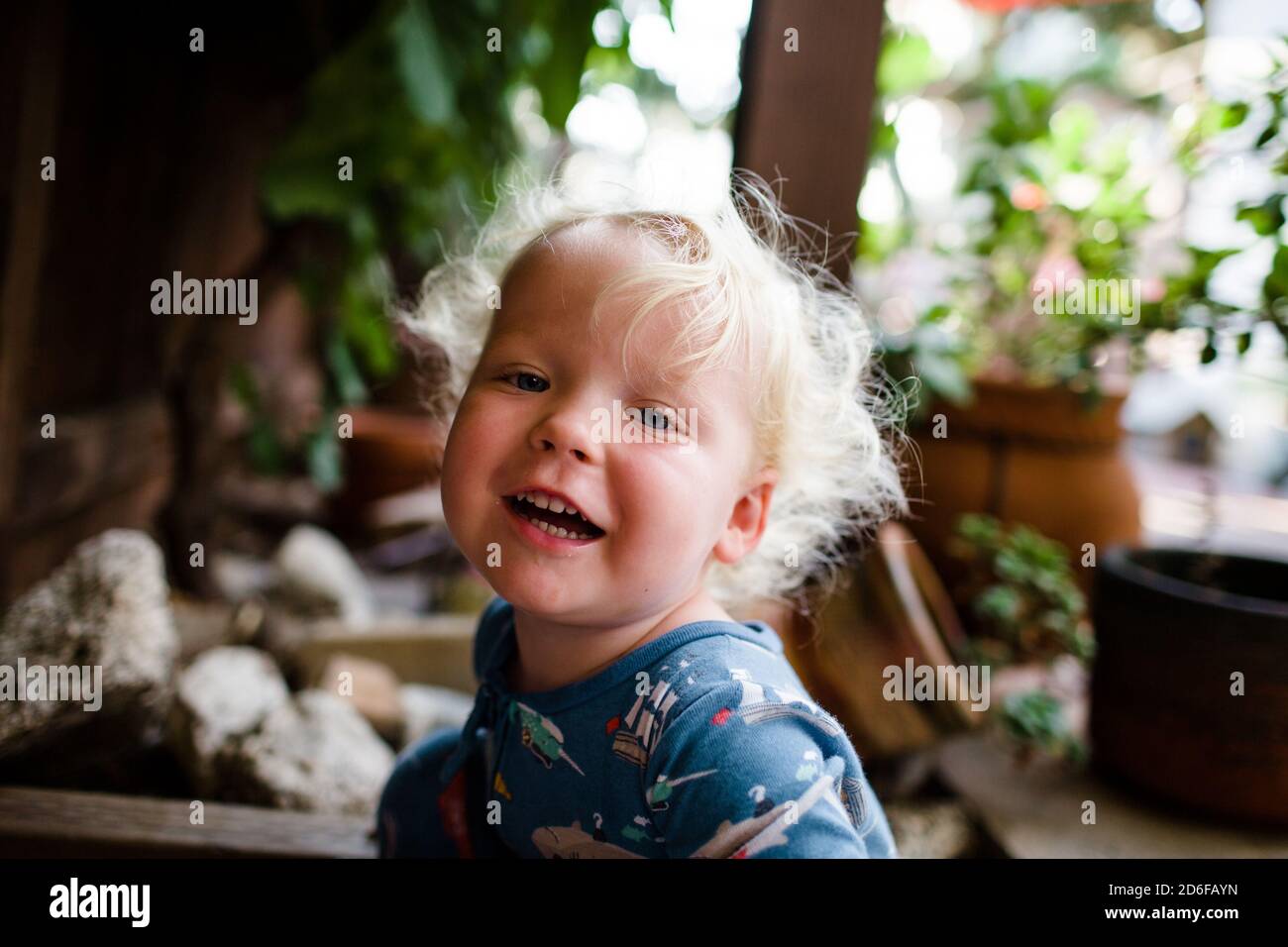 Close Up of Two Year Old Smiling for Camera in Yard Stock Photo - Alamy