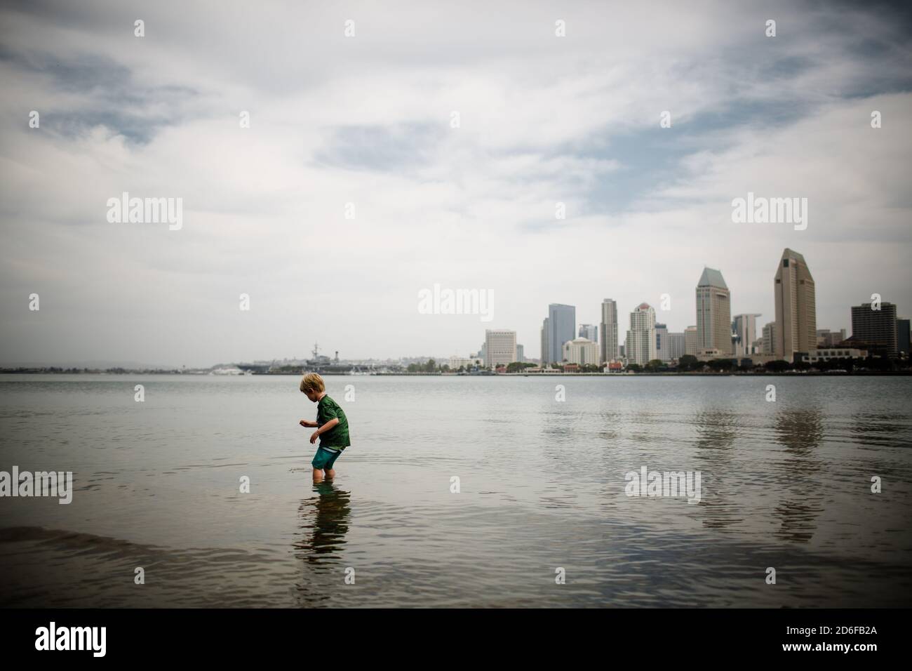 Six Year Old Boy Wading in Coronado Bay San Diego Skyline Stock Photo ...