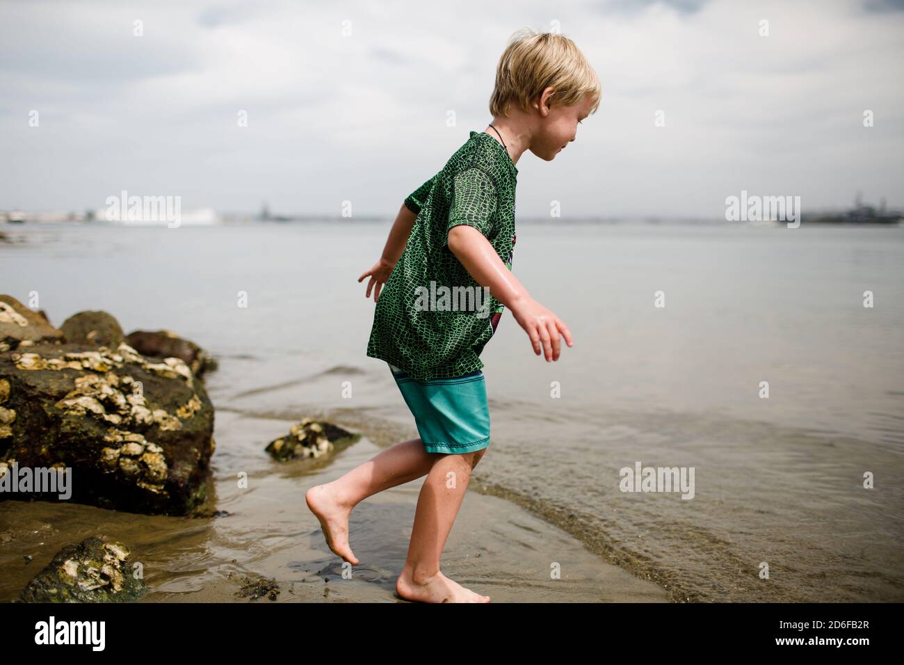 Six Year Old Boy Playing on Beach in Coronado Stock Photo - Alamy