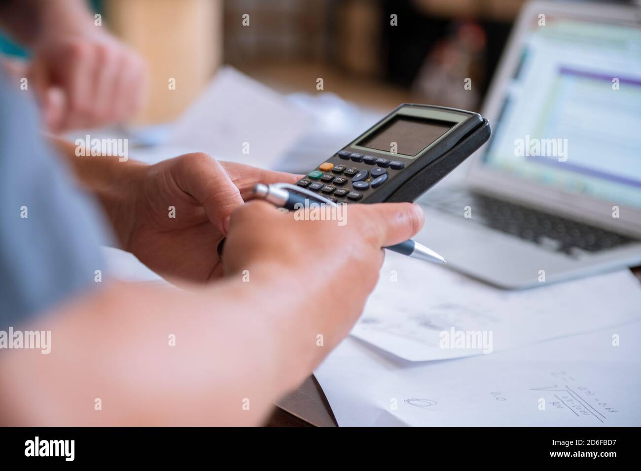 Man men male using calculator hi-res stock photography and images - Alamy
