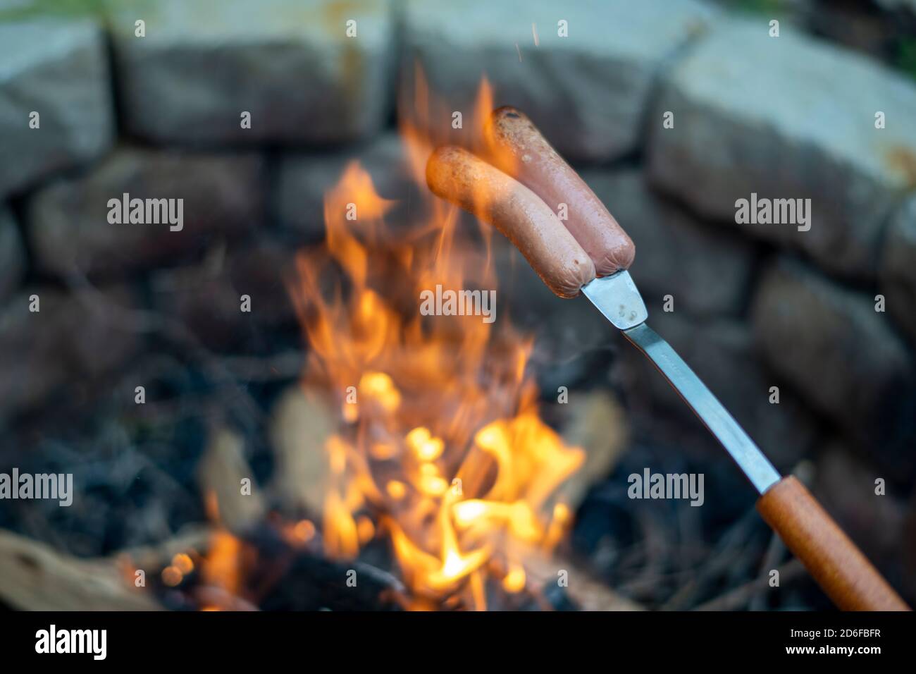 Cooking hot dogs over fire hi-res stock photography and images - Alamy