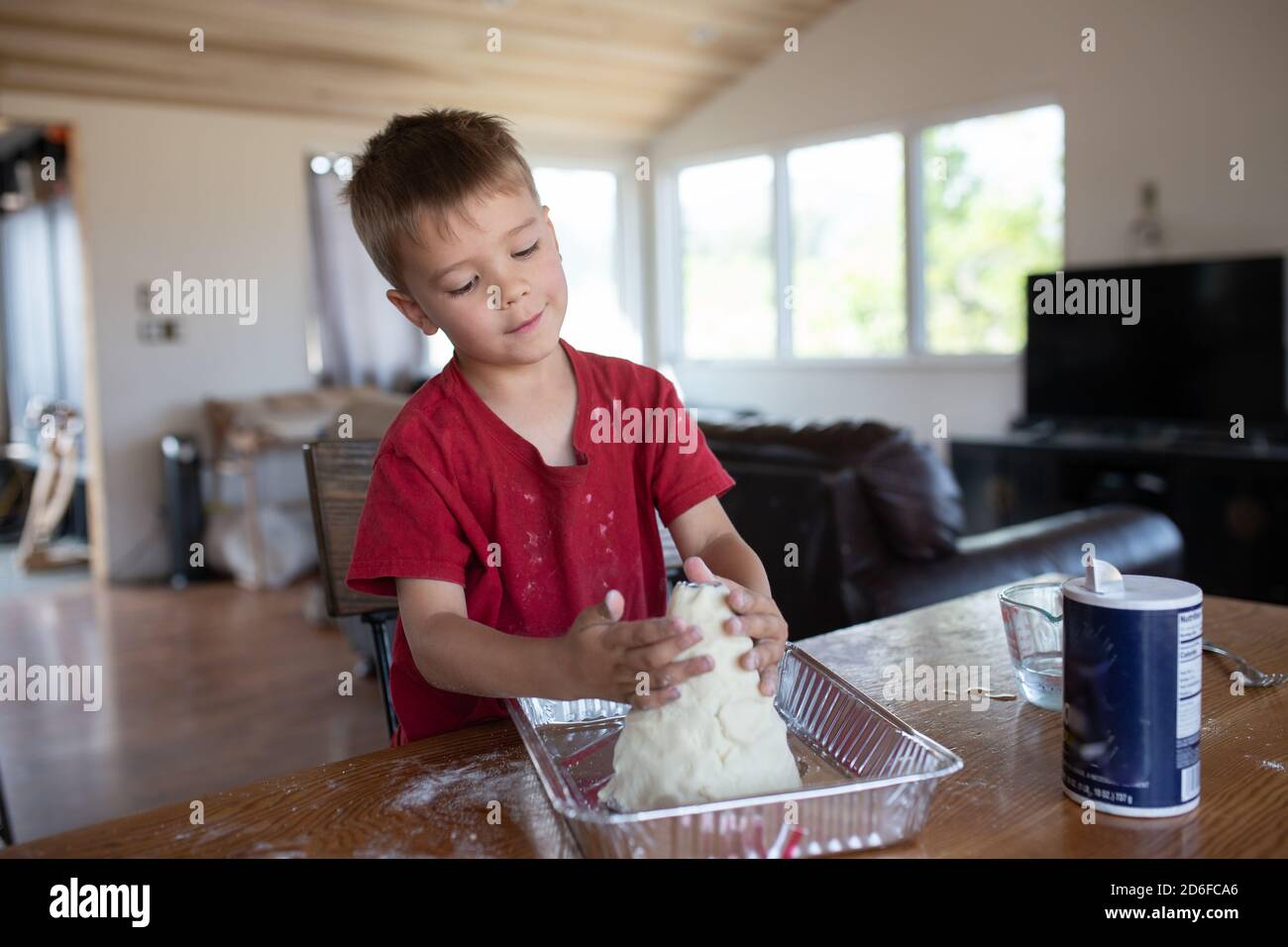 Boy building clay volcano at homeschool Stock Photo - Alamy
