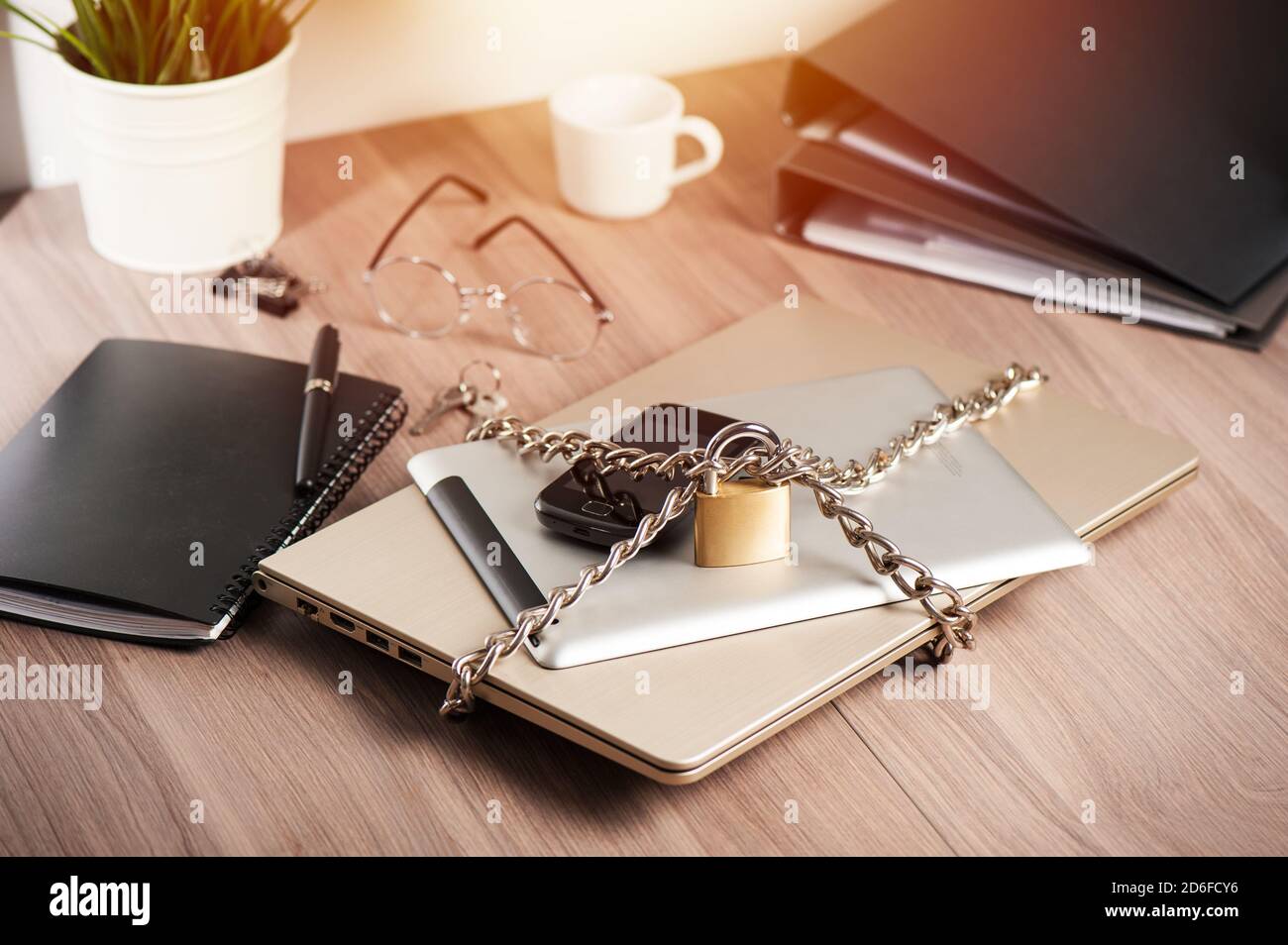 important information locked with chain and padlock, computer and data ...