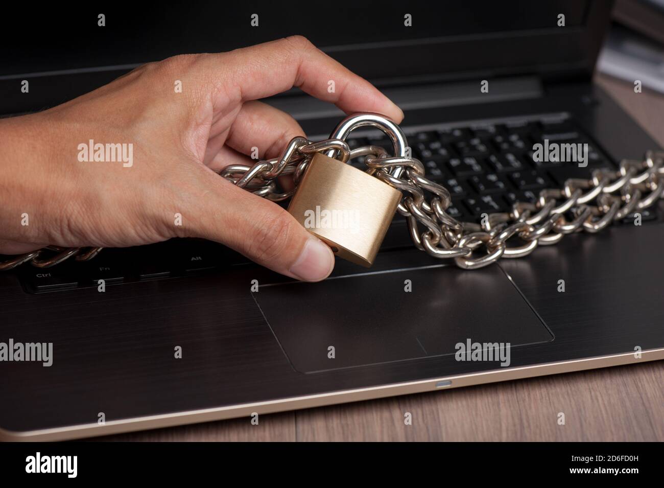 locking the padlock with laptop in the background, computer and data ...