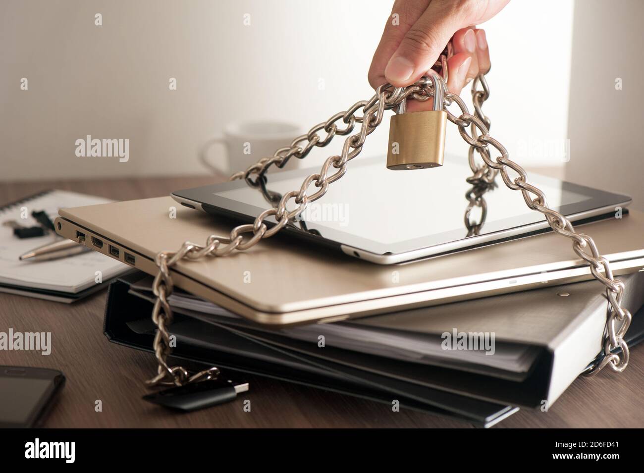 important information locked with chain and padlock, computer and data ...