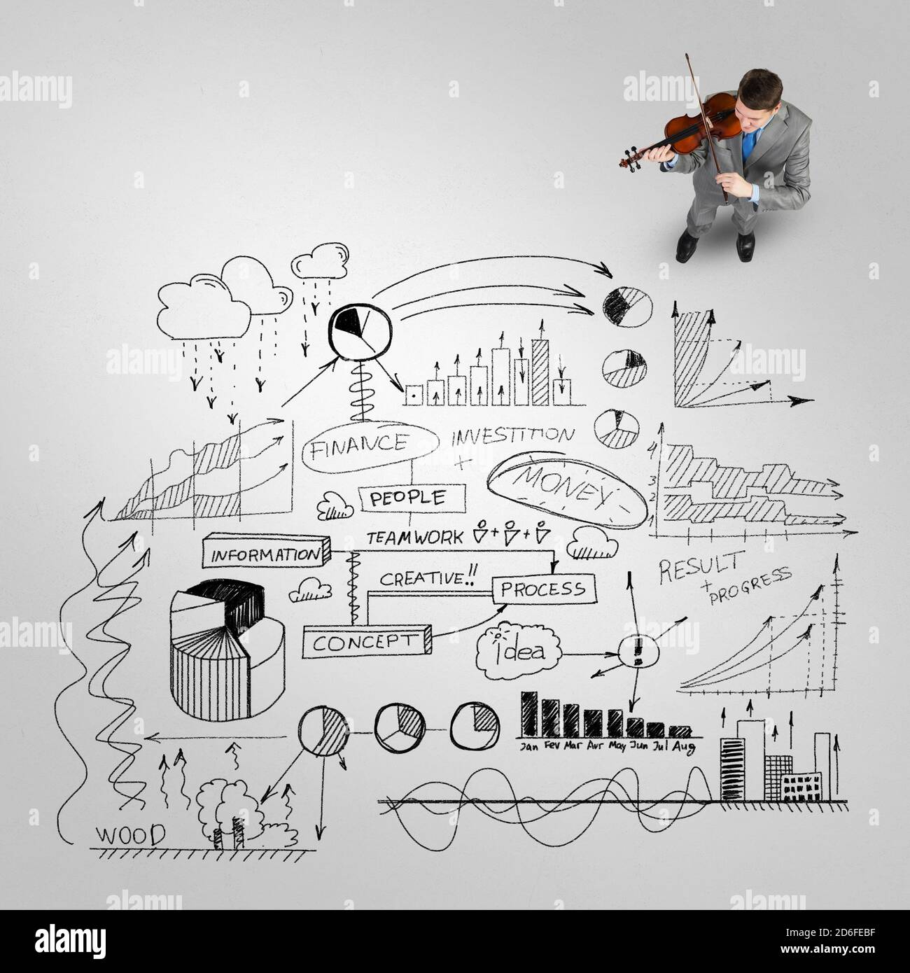 Businessman play success melody Stock Photo - Alamy