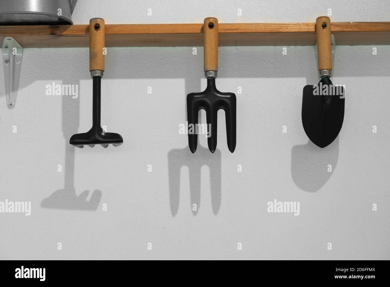 black metal rake fork and trowel for gardening hobby or agriculture ...