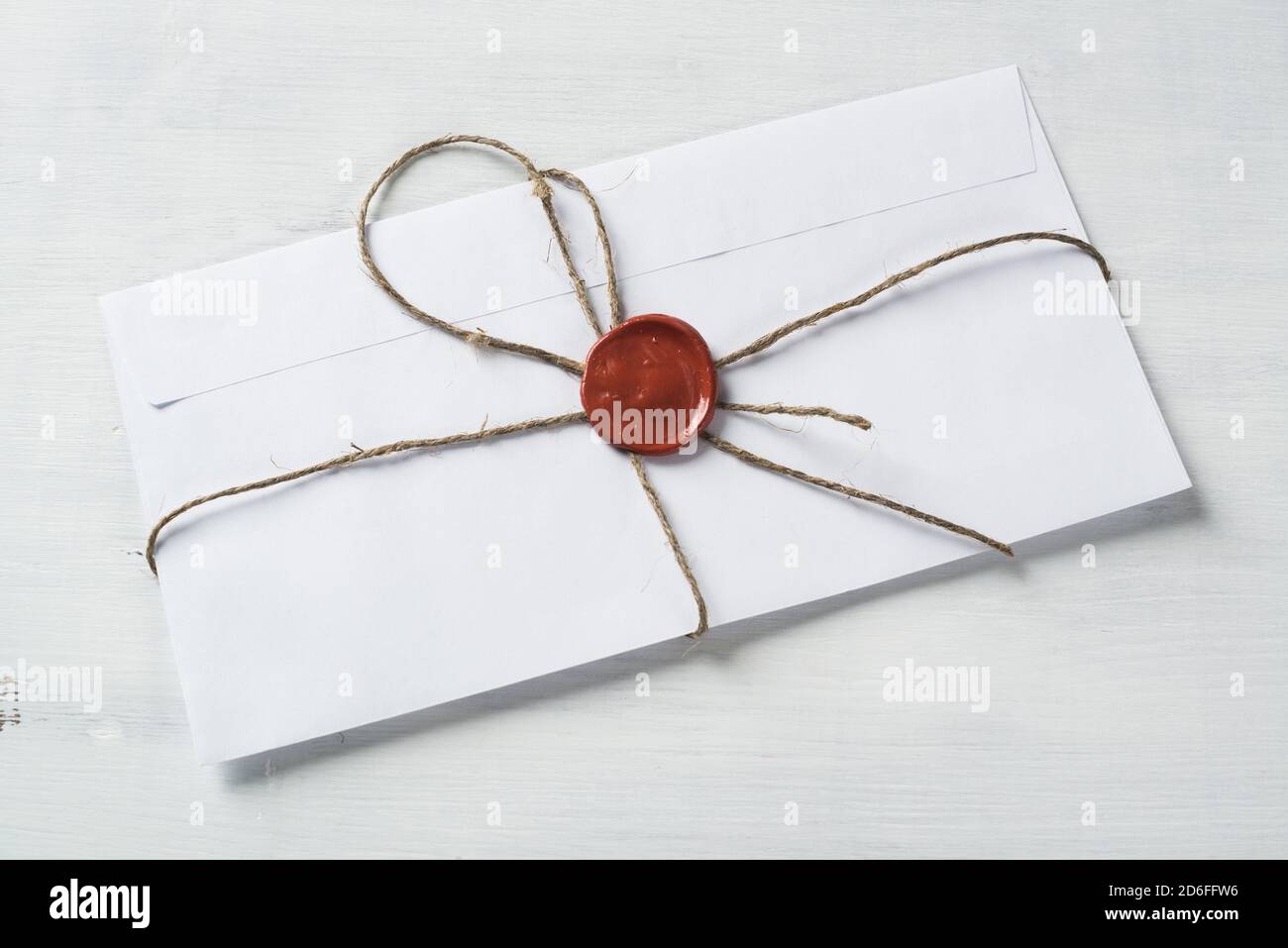 Letter with seal on table Stock Photo - Alamy