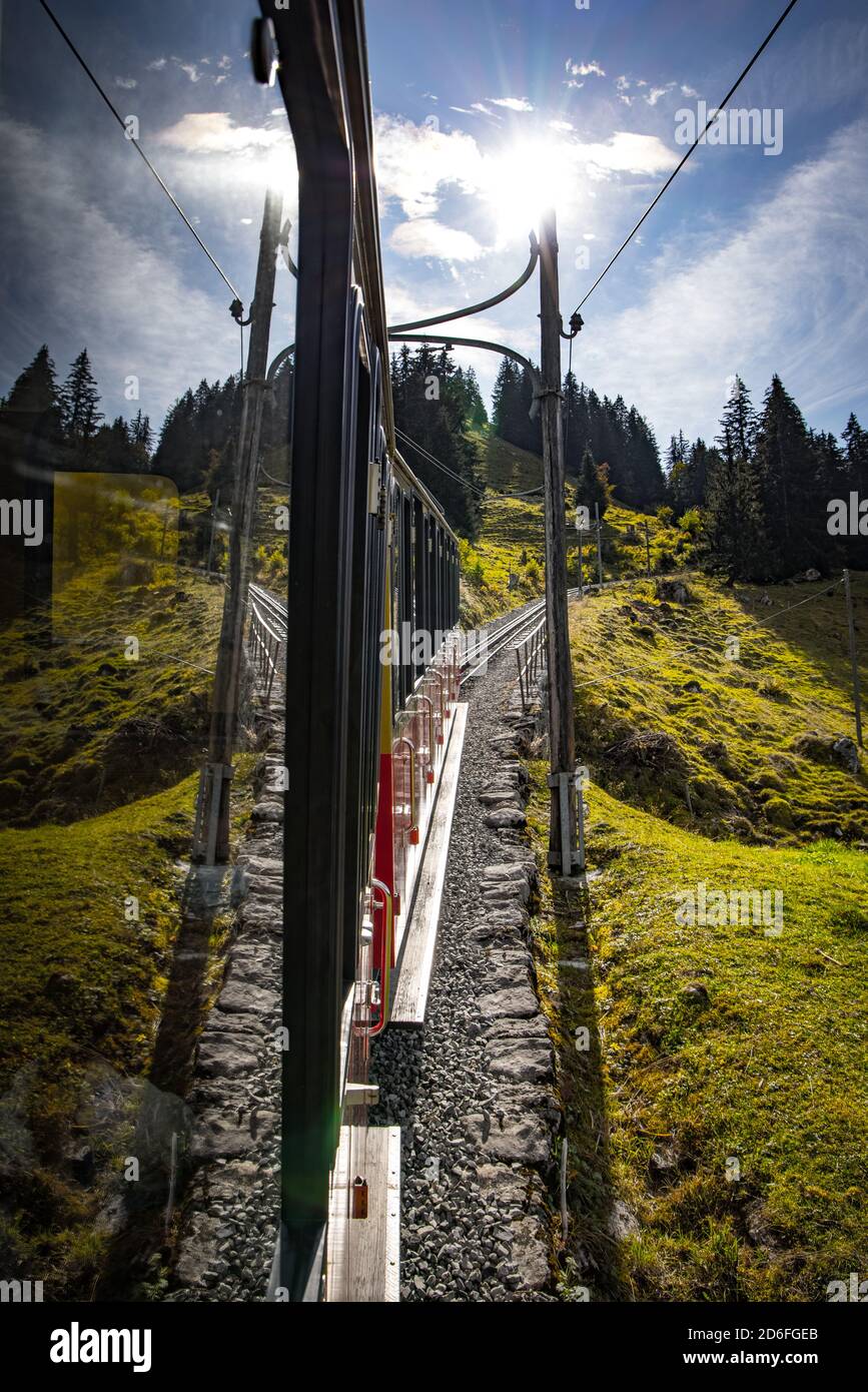 Cog railway train in the Swiss Alps Stock Photo - Alamy