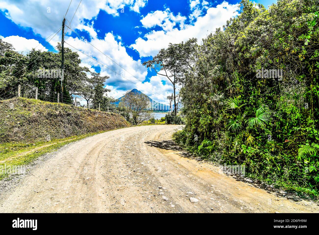 road in mountains, landscape with Arenal Volcan in costa rica central ...