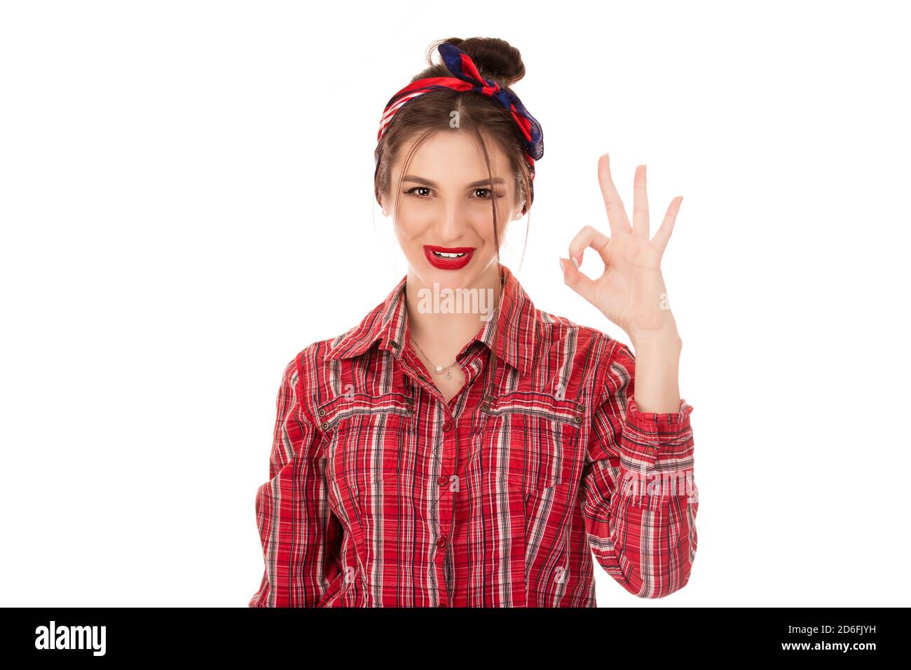 Everything will be alright. Beautiful young happy woman showing Ok sign ...