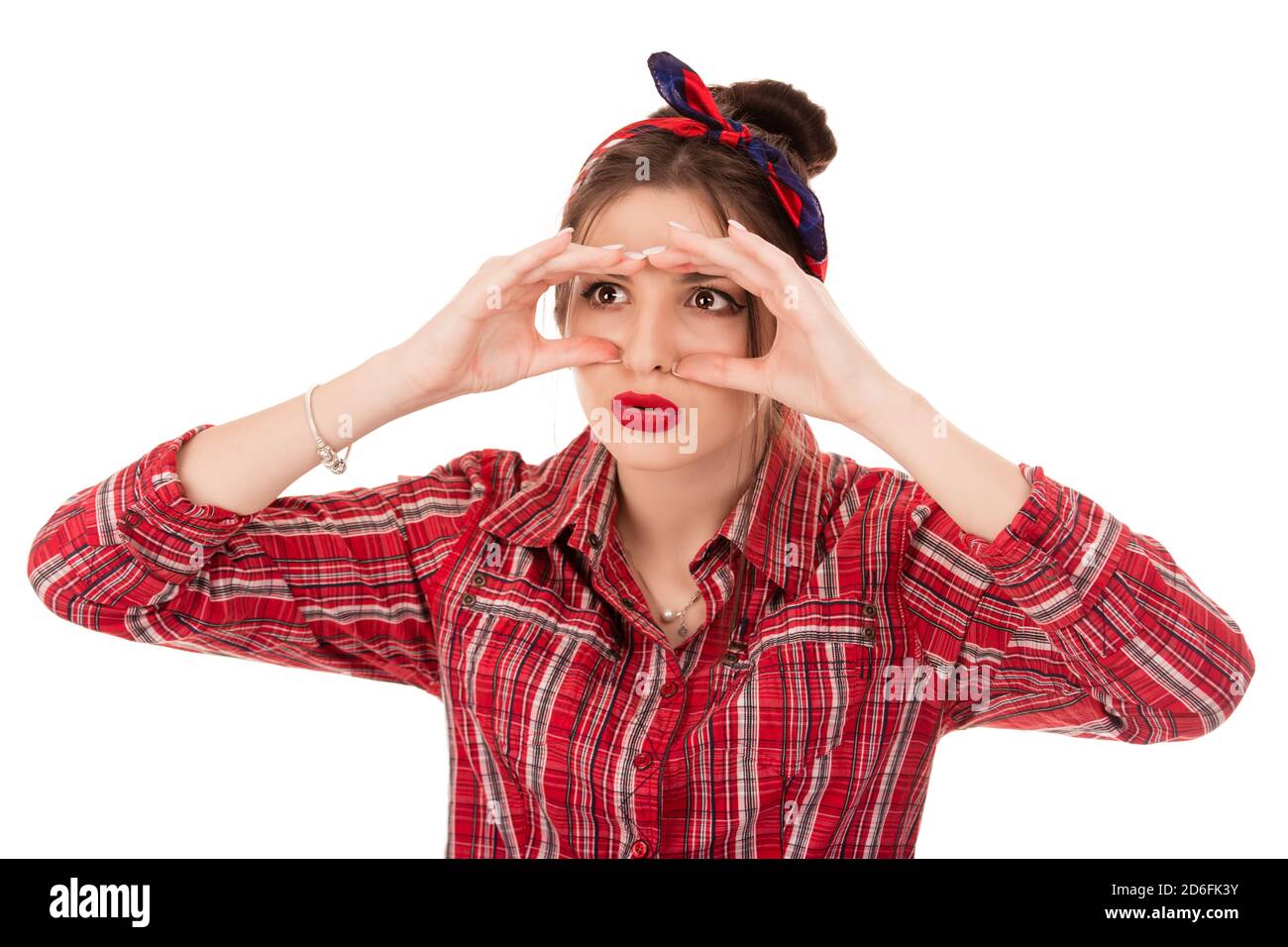 Peering concept. Closeup portrait young pretty stunned curious woman ...