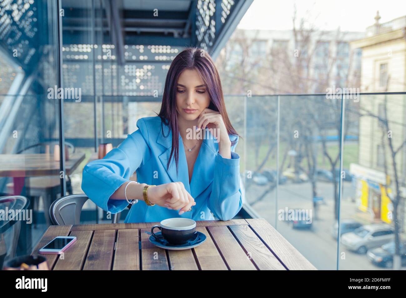 Checking watch outside restaurant hi-res stock photography and images ...